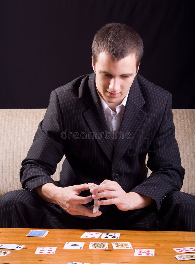 Playing poker stock photo. Image of casino, holding, brim - 9720690