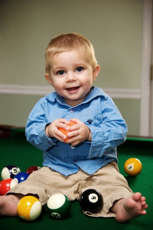 Playing with pool balls stock photo. Image of hall, pool - 5022886