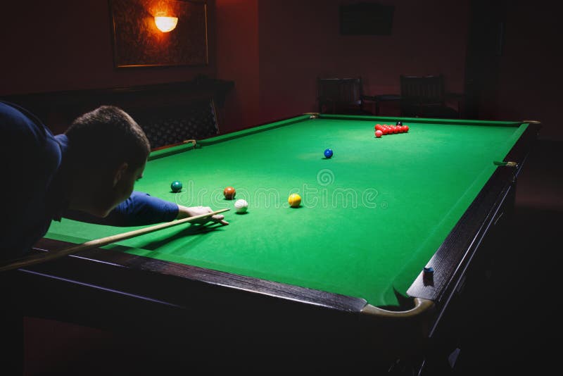 Playing Pool, Man Aiming the Billiard Ball Stock Photo - Image of ...