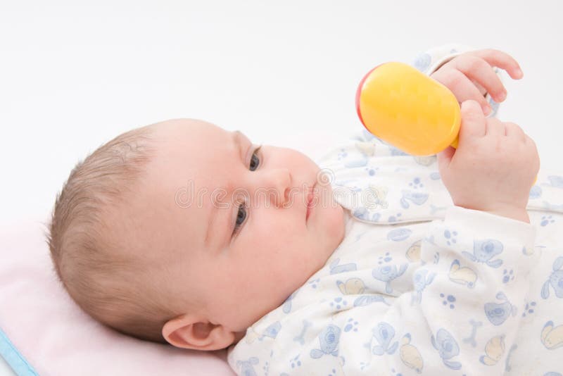 Playing with rattle stock photo. Image of innocent, childhood - 4917700