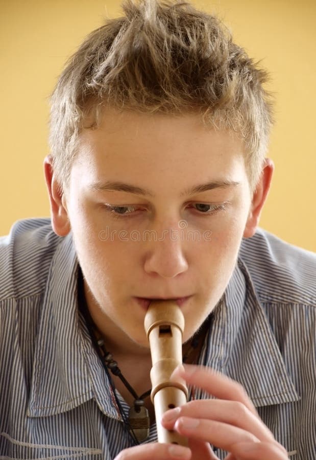 Playing the recorder stock image. Image of recorder, expression - 10817653