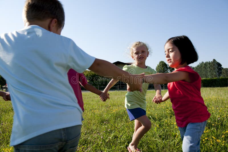 Playing Ring-around-the-rosy Stock Image - Image of naturalness, child ...