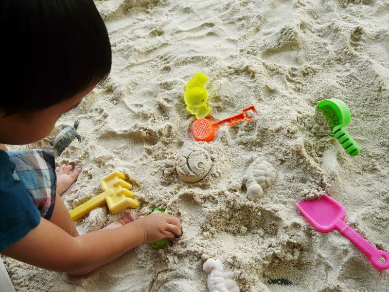 Playing with sand stock photo. Image of character, cheerful - 51803716