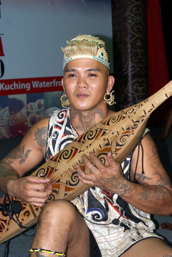 Malaysian Sape Player at BIT 2012 Editorial Photo - Image of music ...