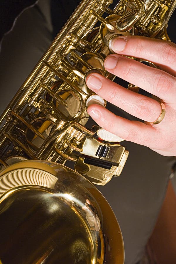 Playing the Saxophone stock image. Image of saxophone, tune - 513725