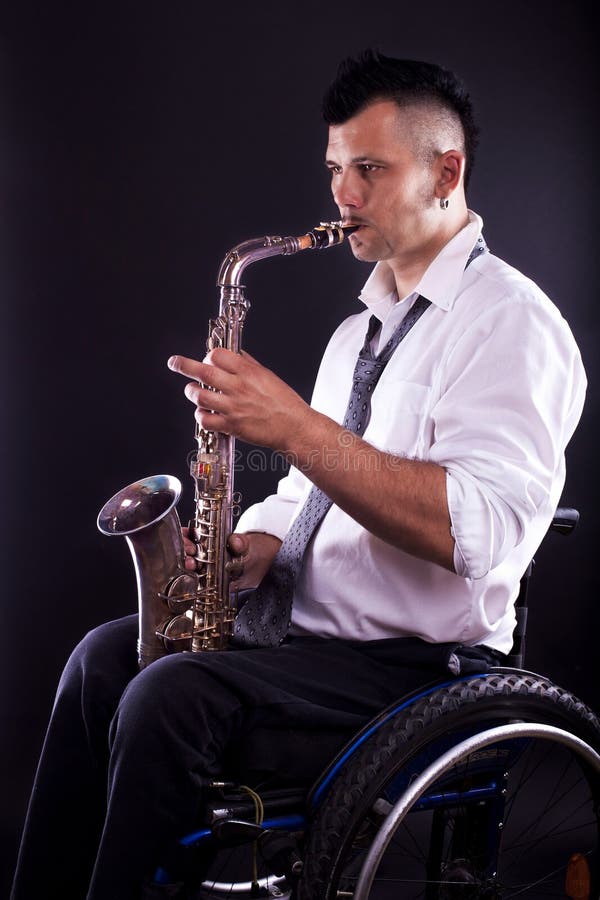 Playing saxophone stock photo. Image of mobility, indoors - 32823842