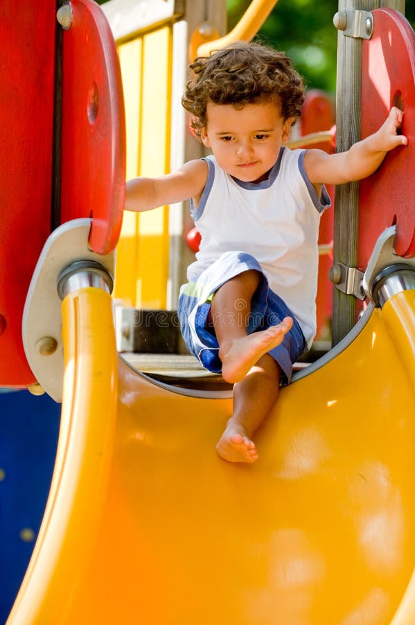 Playing on Slide stock photo. Image of outdoors, sunny - 5010026