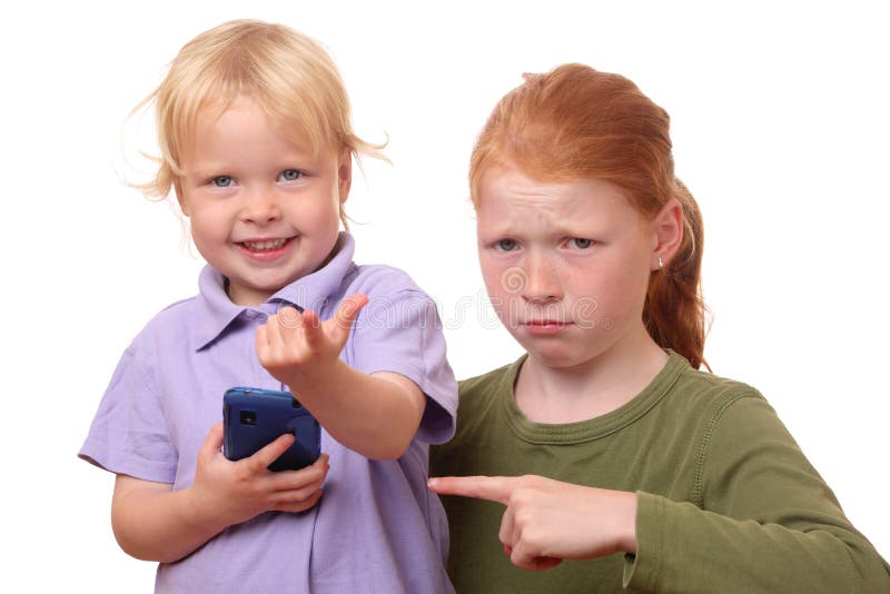 Two girls with cell phones stock image. Image of girls - 15402939