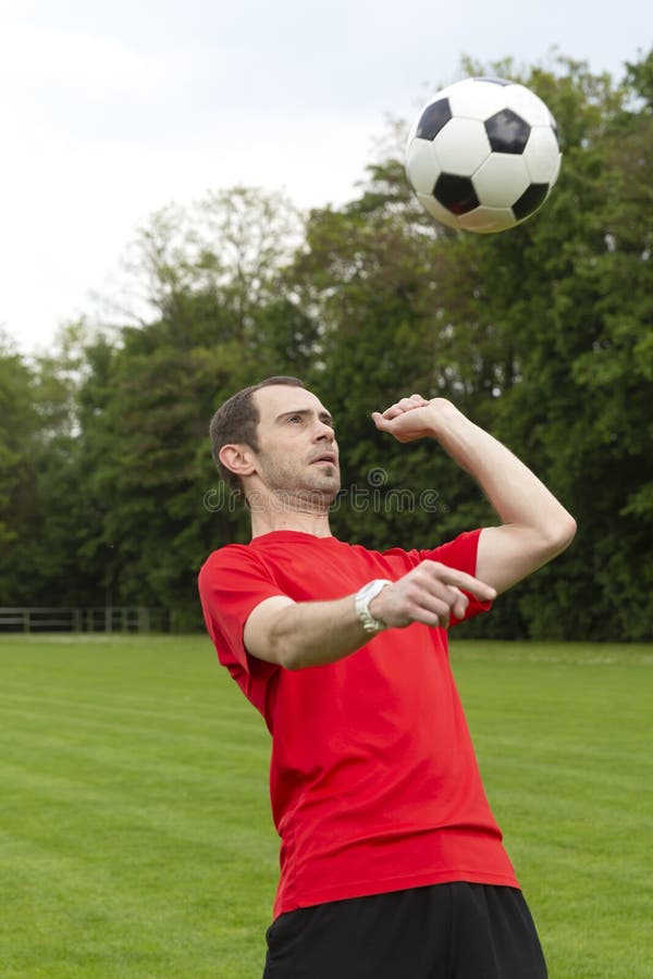 Playing Soccer Ball stock photo. Image of sportsman - 163770098