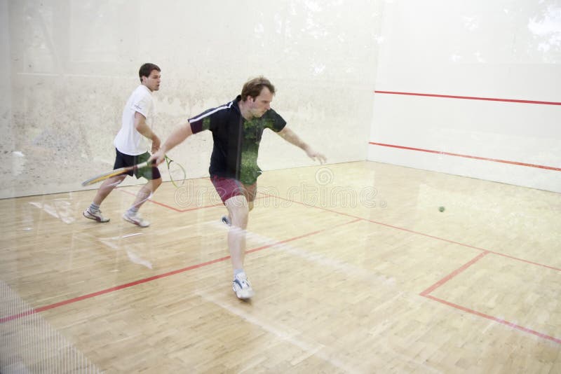 Two person playing squash stock image. Image of effort - 528583