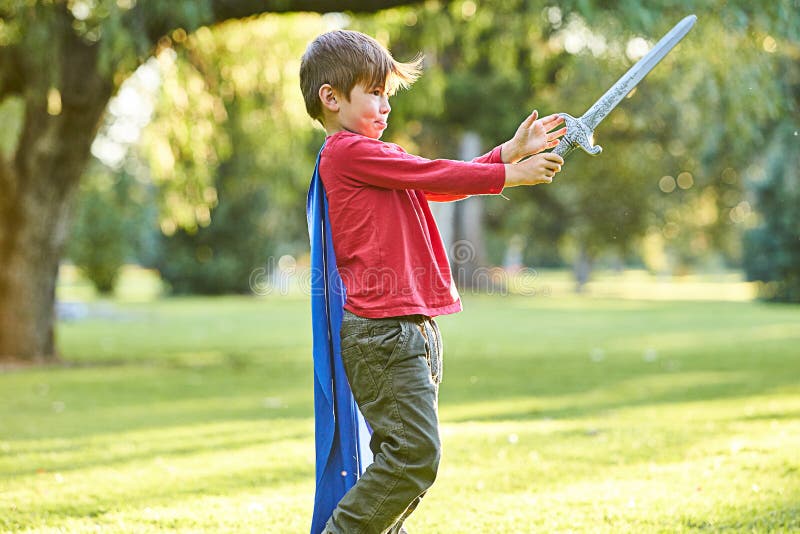 Playing with sword stock photo. Image of playing, tree - 94892036