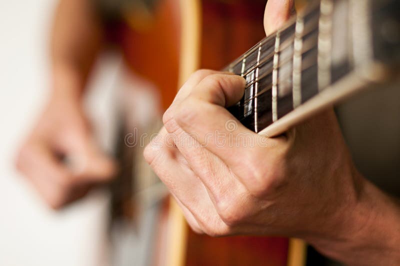 Playing a Twelve String Acoustic Guitar Stock Photo - Image of ...