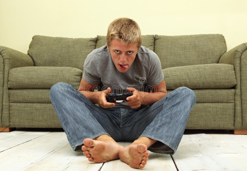 Playing video games stock image. Image of technology - 26130595