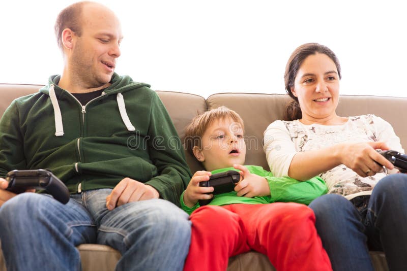 Playing Video Games at Home Stock Image - Image of cute, family: 245567309