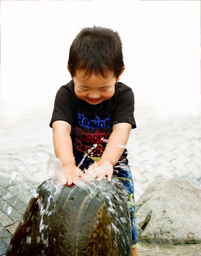 Boy Laughing With Water Drops On Face Stock Image - Image of face ...