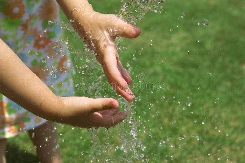 Playing with water stock image. Image of bead, drop, spray - 873599