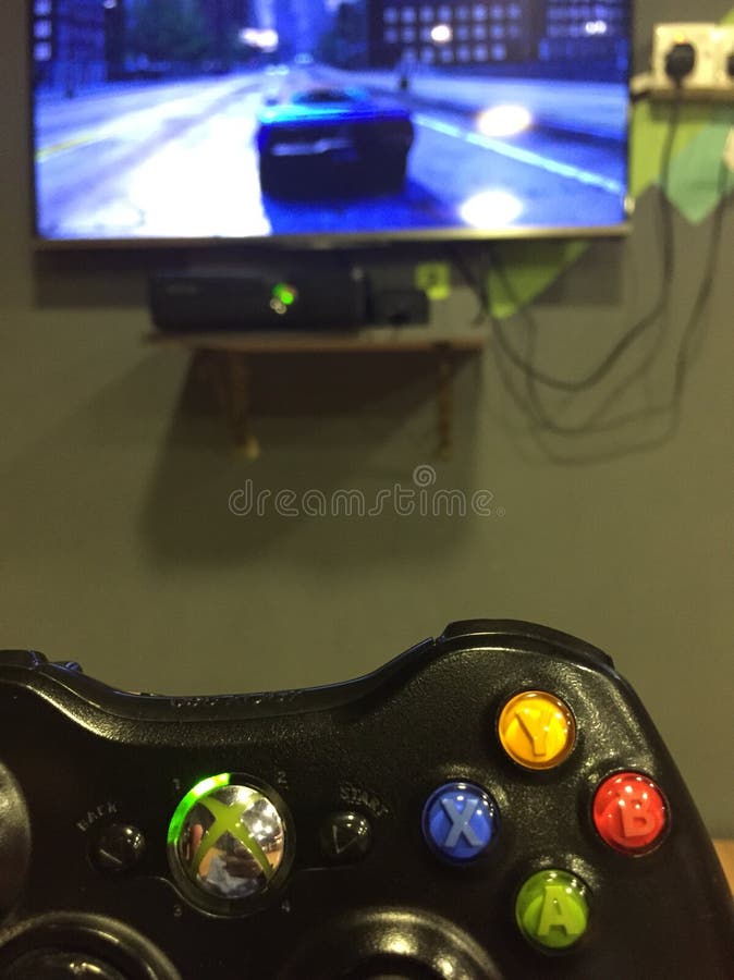 Playing Xbox editorial stock image. Image of racing - 126638324