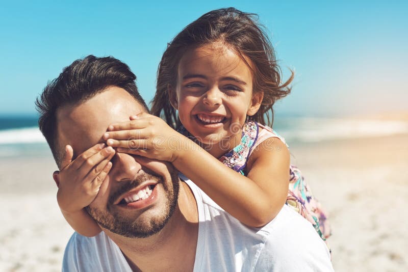 Playtime With Daddy A Young Father And His Daughter Enjoying A Day At