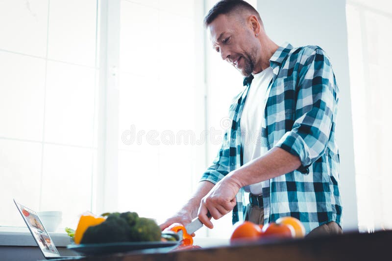 Pleasant Adult Man Developing His Cooking Skills Stock Image - Image of ...