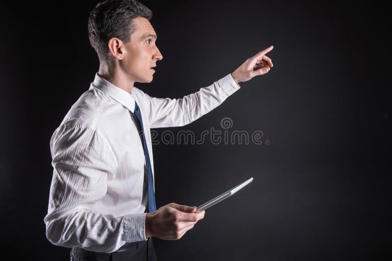 Pleasant Adult Man Pointing at the Screen Stock Image - Image of ...