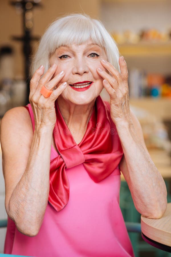 Pleasant Good Looking Woman Caring about Her Face Stock Image - Image ...