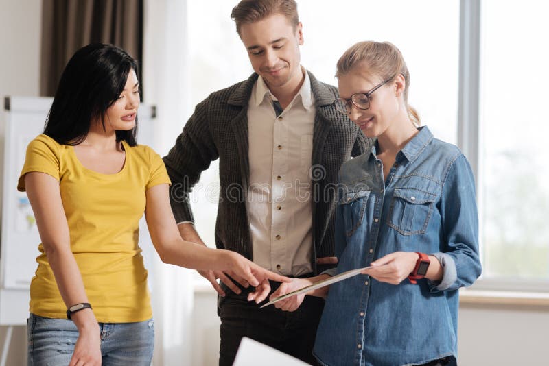 Pleasant Hard Working Designers Standing Together Stock Photo - Image ...