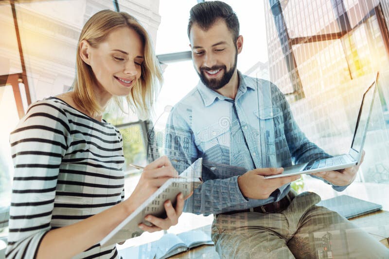 Pleasant Interested Office Workers Smiling and Doing Recordings. Stock ...