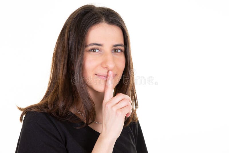 Pleasant Looking Long Brown Haired Young Woman Makes Silence Shh