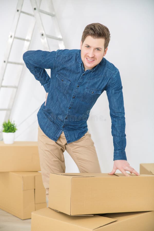 Pleasant Man Packing the Boxes Stock Photo - Image of handsome, inside ...