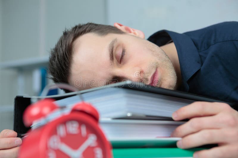 Pleasant Man Sleeping in Office Stock Photo - Image of indoor, striped ...