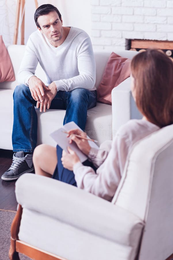 Pleasant Nice Man Looking at His Therapist Stock Image - Image of moral ...