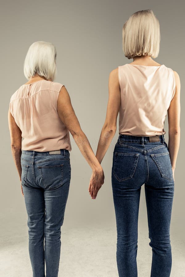 Pleasant Nice Women Turning Their Back To the Camera Stock Image ...
