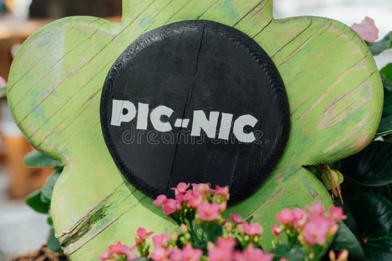 Pleasant Picnic Area in the Park with Picnic Sign Stock Image - Image ...