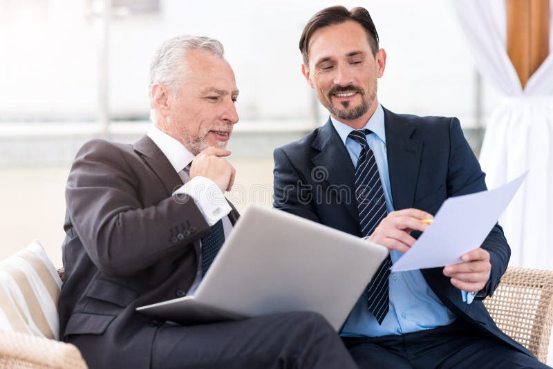 Pleasant Professional Colleagues Sitting on the Couch Stock Image ...
