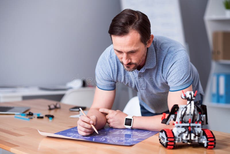 Pleasant Professional Engineer Working on the Project Stock Photo ...