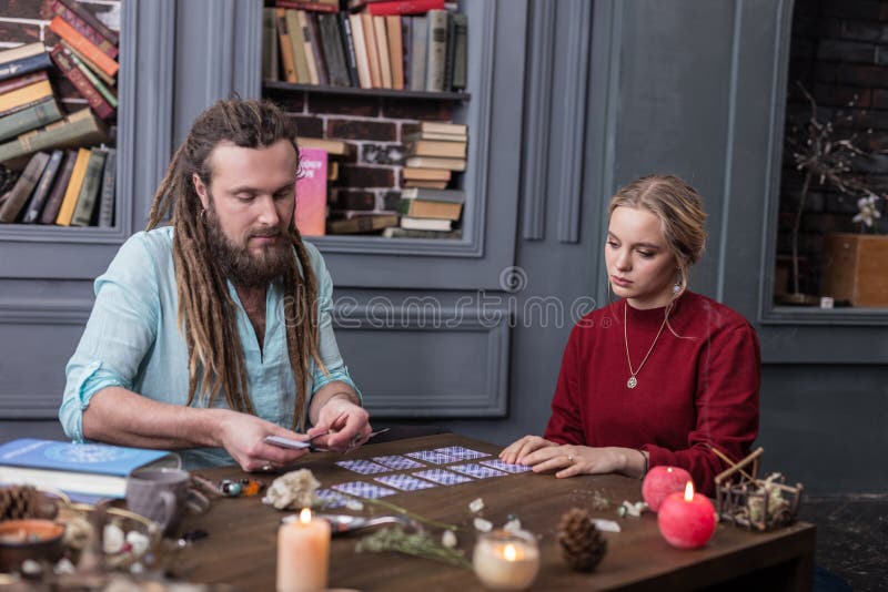 Pleasant Serious Man Putting Cards on the Table Stock Photo - Image of ...