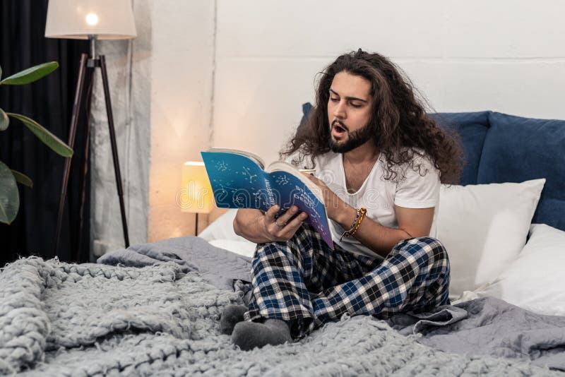 Pleasant Sleepy Tired Man Seriously Studying Astrology Stock Photo ...