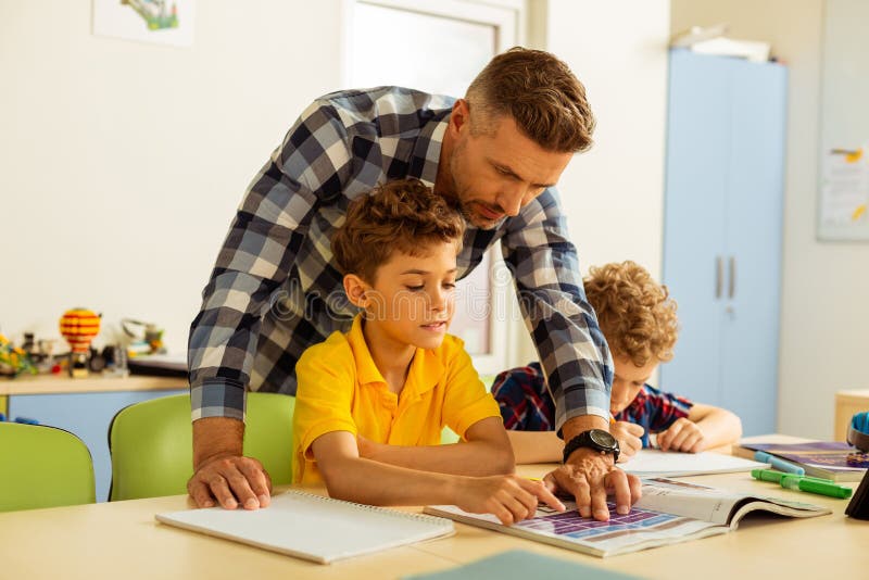 Pleasant Smart Boy Learning How To Read English Stock Photo - Image of ...