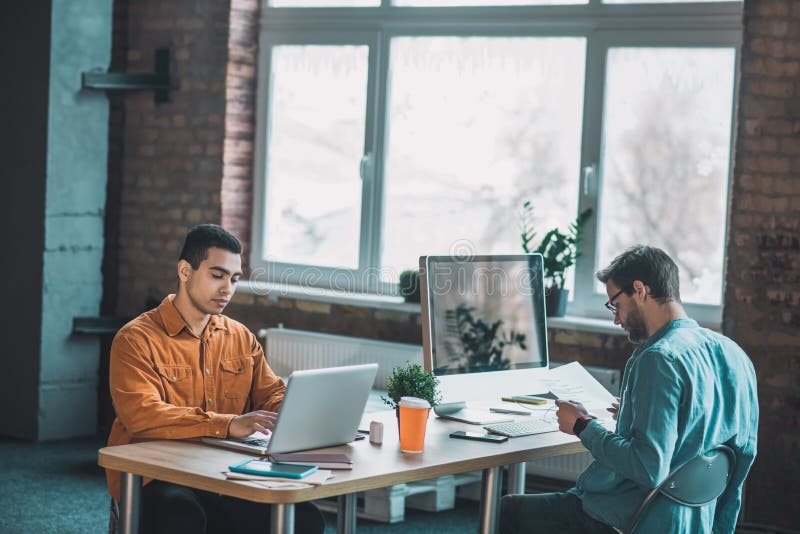 Pleasant Smart Men Being Involved in Their Tasks Stock Image - Image of ...