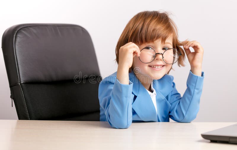 Pleasant Smiling Ginger Kid Holding His Glasses Stock Image - Image of ...