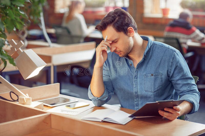 Pleasant Tired Man Sitting at the Table Stock Image - Image of style ...