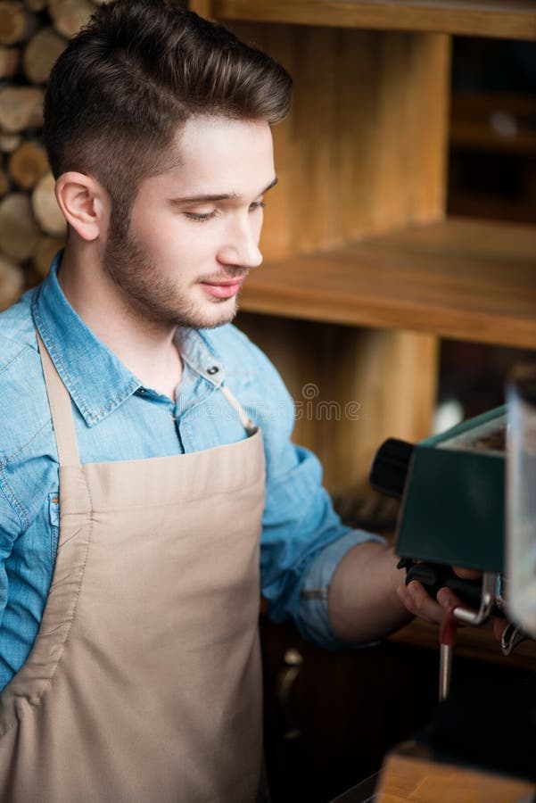 Pleasant Waiter Making Coffee Stock Image - Image of beverage, brunette ...