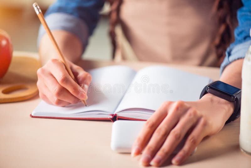 Pleasant Woman Making Notes Stock Image - Image of hand, casual: 71536091