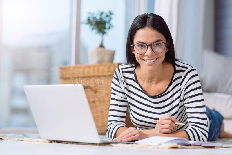 Pleasant Woman Using the Laptop at Home Stock Photo - Image of computer ...