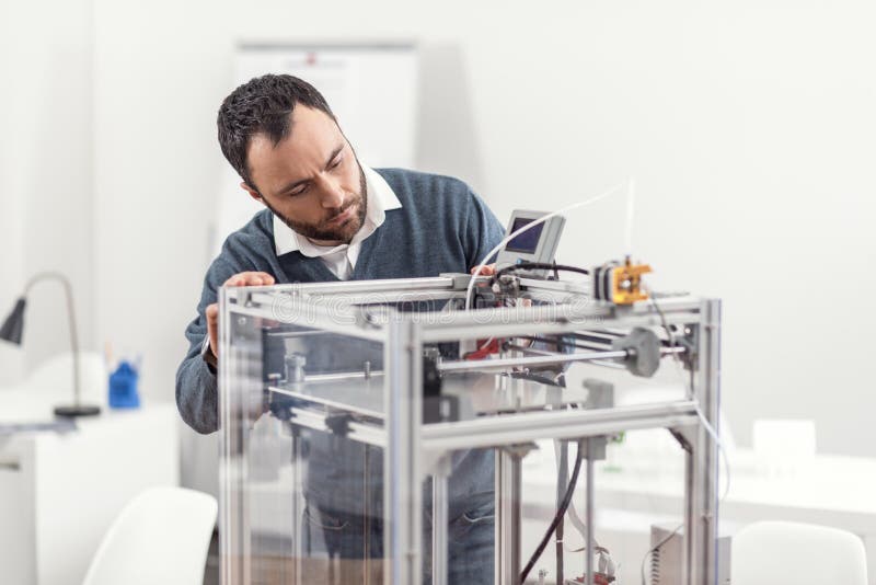 Working 3D Printer. Electronic Three Dimensional Printing Machine in ...