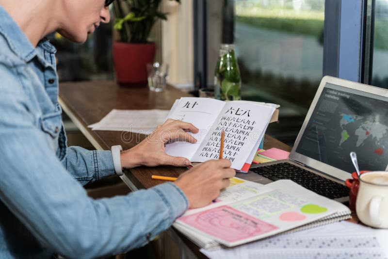 Pleasant Young Man Doing His Homework Stock Photo - Image of person ...