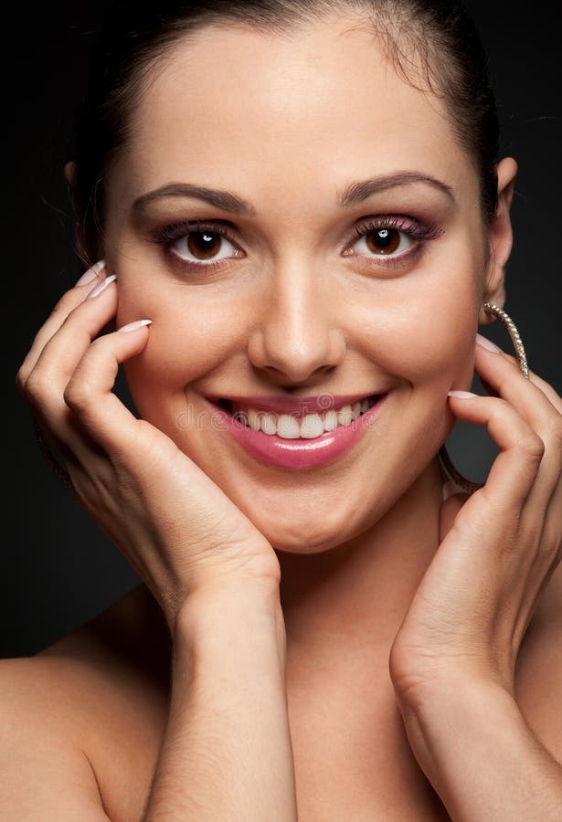 Pleasant Young Woman Smiling while Sitting in a Lotus Pose Stock Image ...