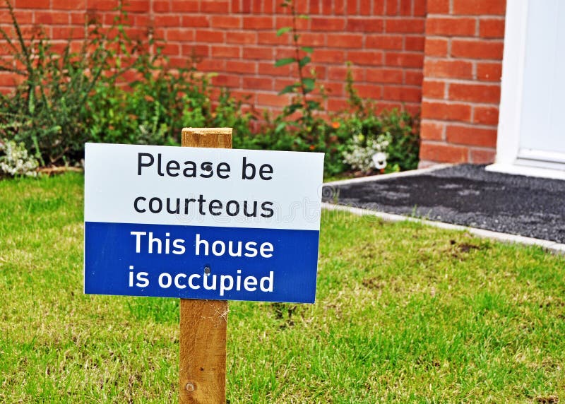 Please Be Courteous - this House is Occupied Stock Photo - Image of ...