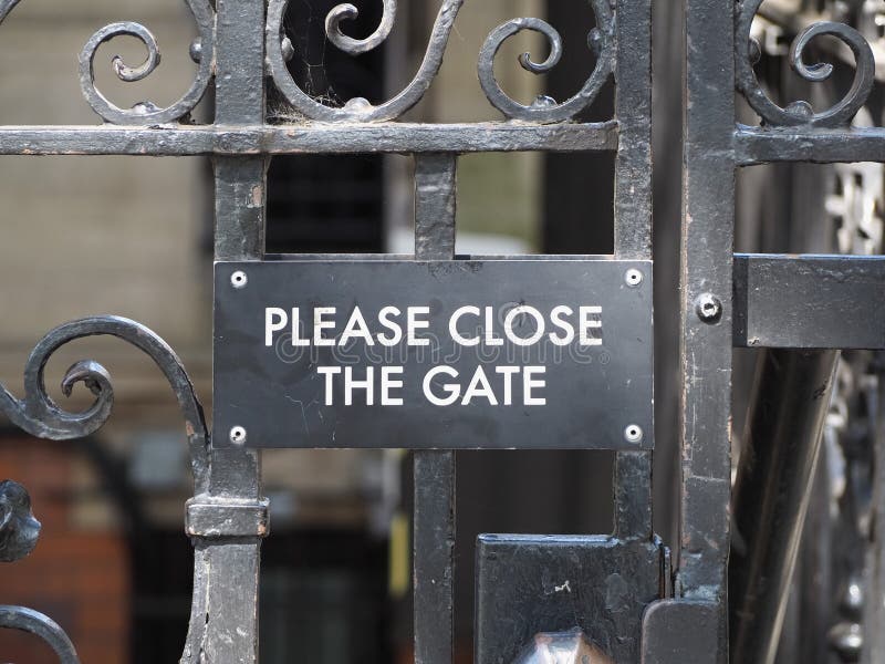 Please close the gate sign stock photo. Image of passage - 306314288