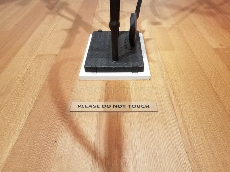 Please Do Not Touch Sign on Floor Near Sculpture Stock Photo - Image of ...
